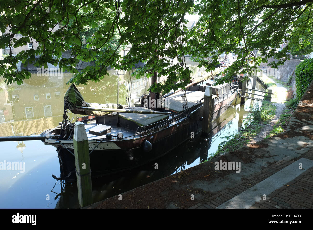 Wooden Dutch sailing barge on the canal at Delfshaven, Rotterdam ...