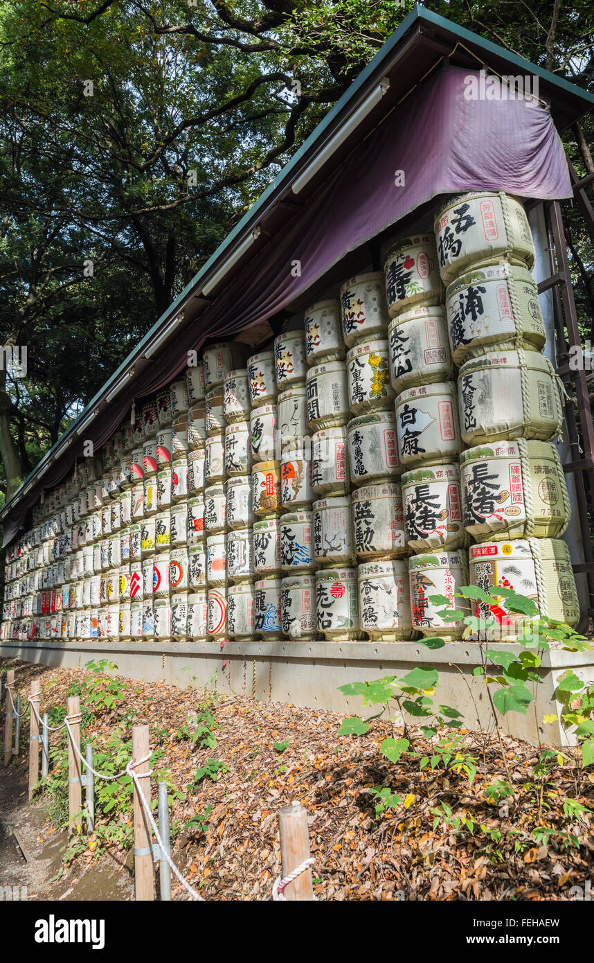 Japanese Barrels of Sake wrapped in Straw stacked on shelf Stock Photo ...