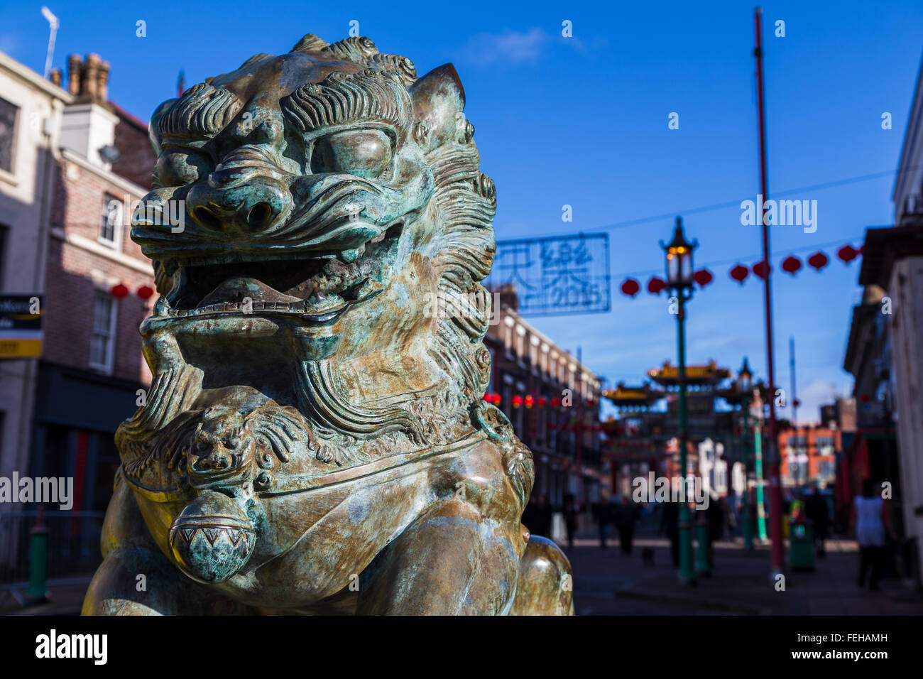 One of the Lion statue's marked the entrance of Chinatown in Liverpool ...