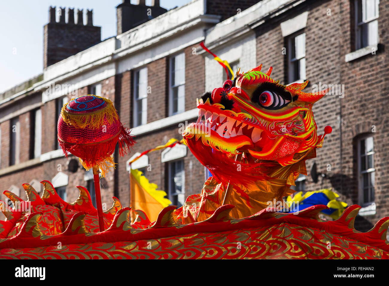 The vivid orange coloured dragon seen dancing around the main streets ...