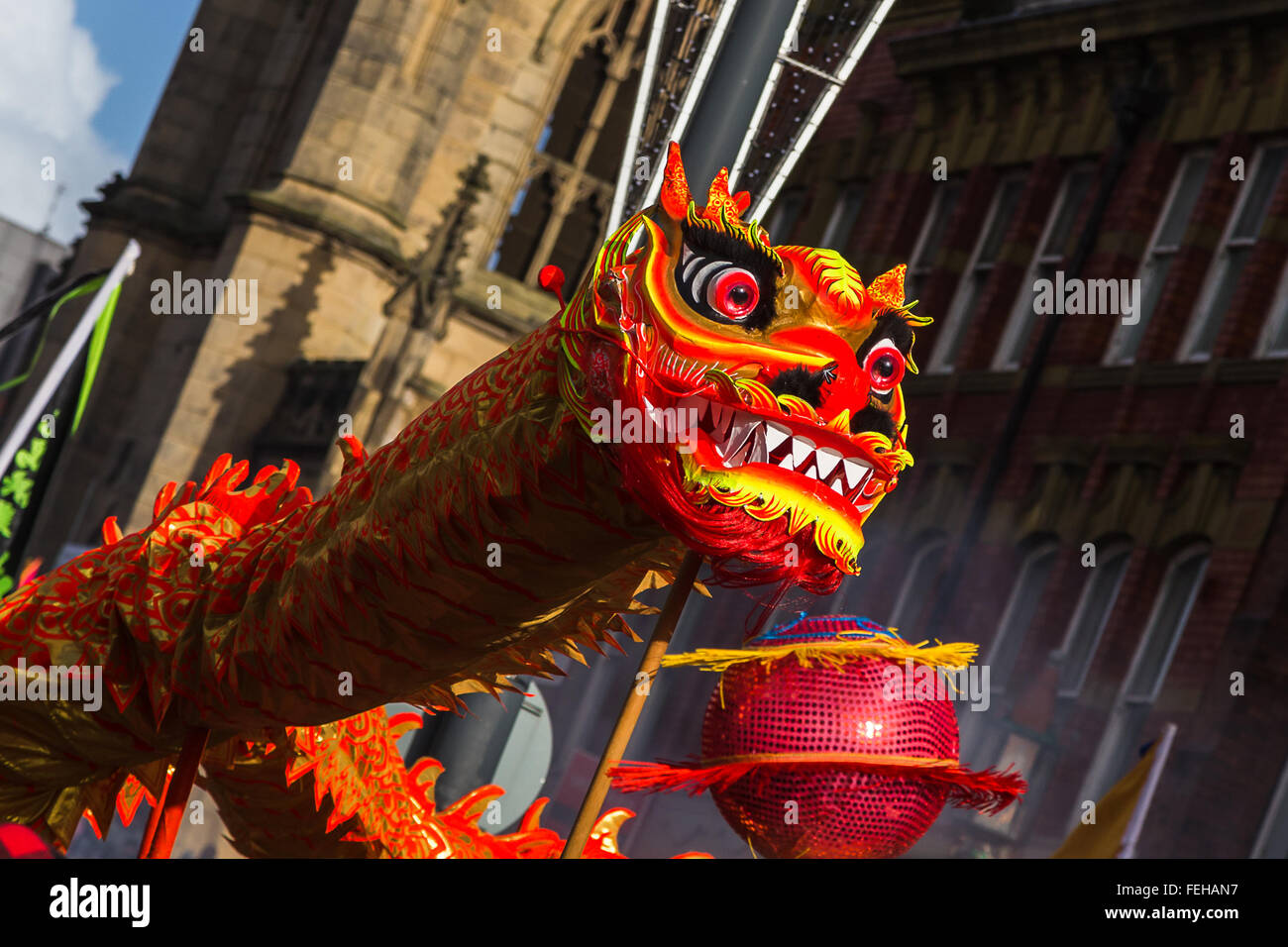 The vivid orange coloured dragon seen dancing around the main streets ...