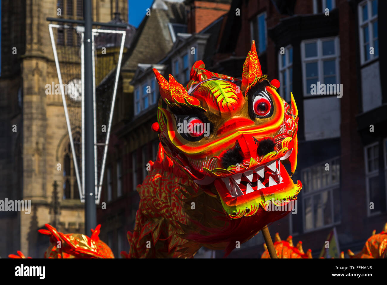 The vivid orange coloured dragon seen dancing around the main streets ...
