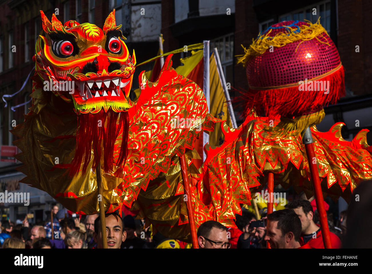 The vivid orange coloured dragon seen dancing around the main streets ...