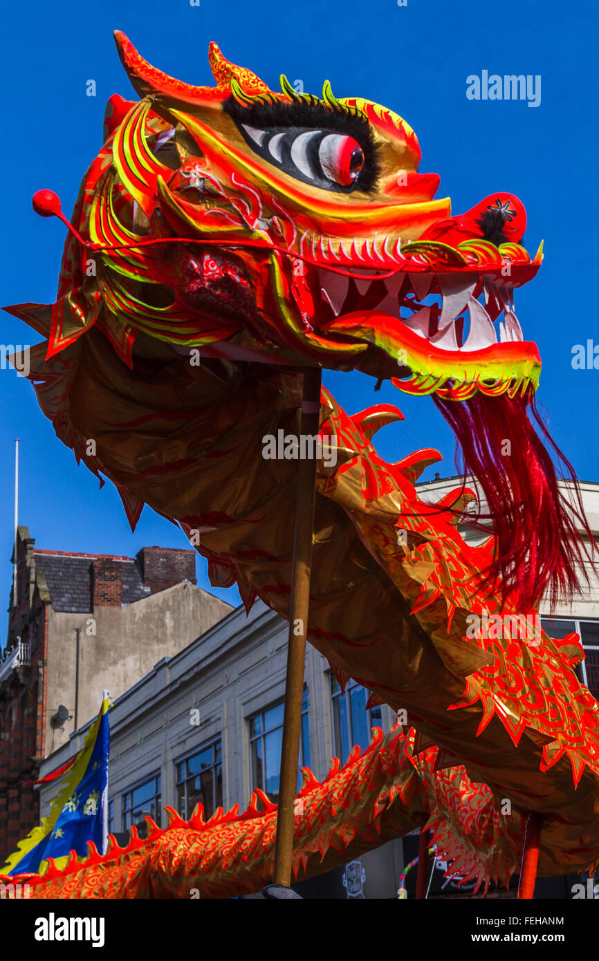 The vivid orange coloured dragon seen dancing around the main streets ...