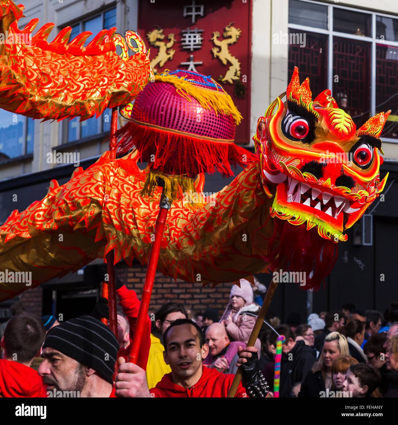 The vivid orange coloured dragon seen dancing around the main streets ...