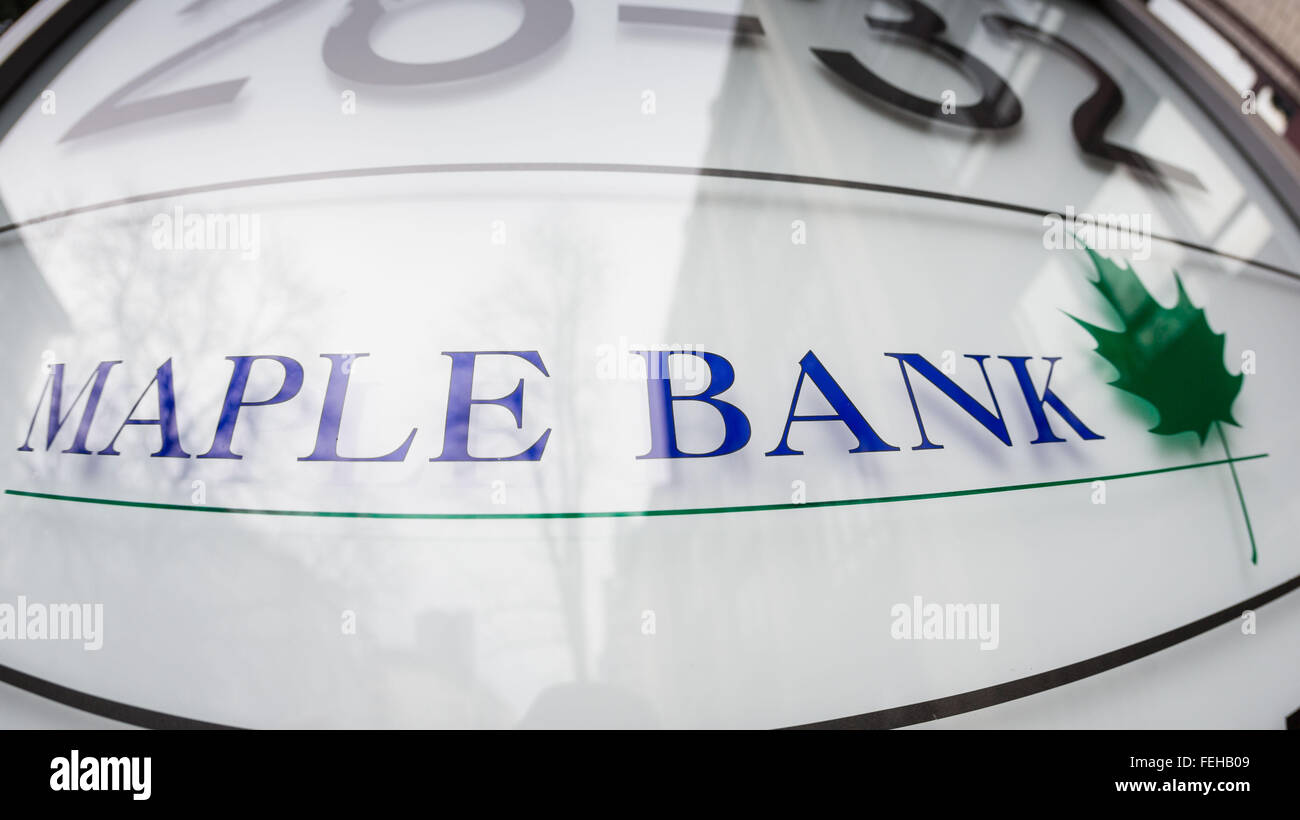 The corporate logo of Maple Bank pictured at the entrance of the bank's ...