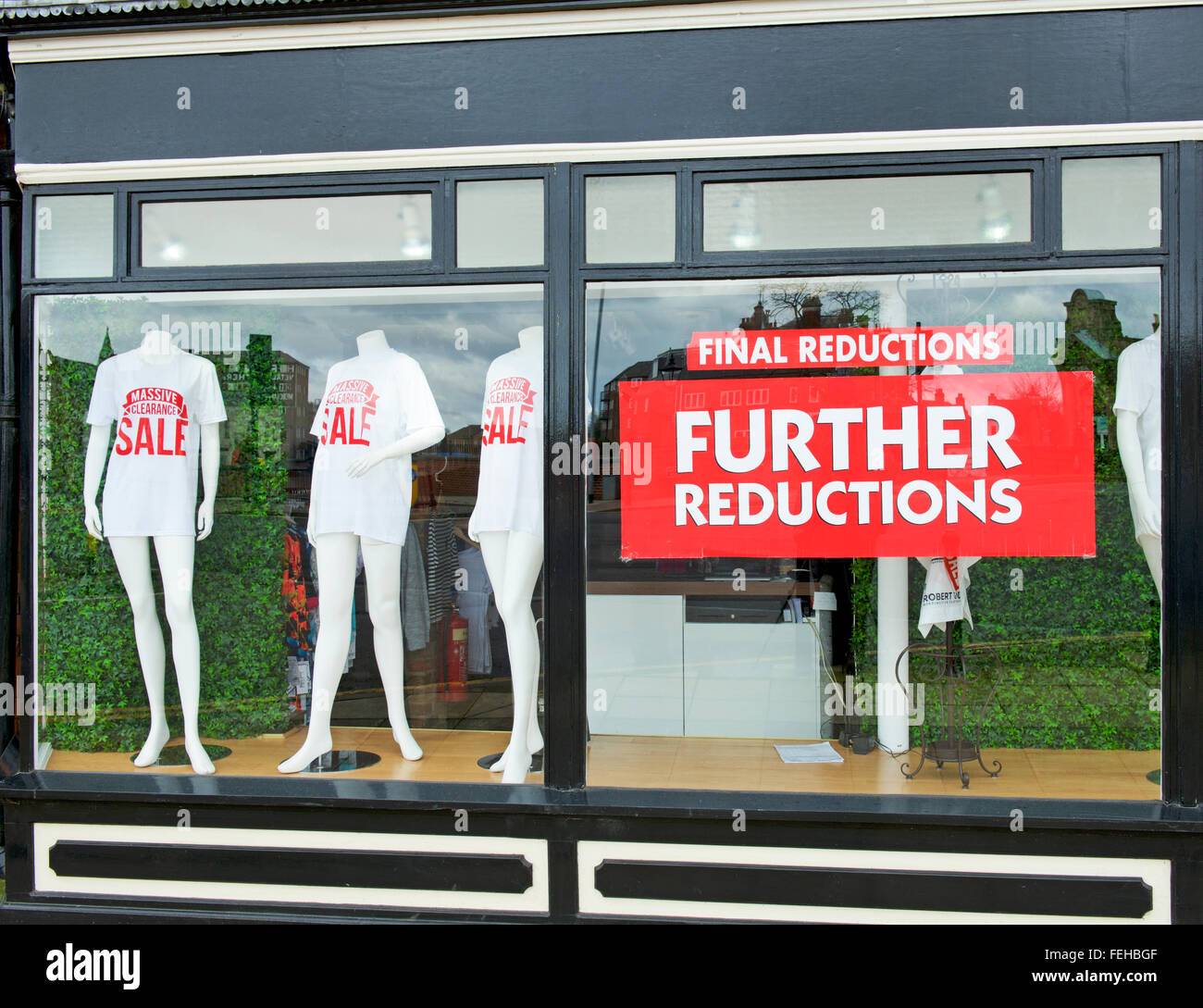 Sale signs - Further Reductions - in shop window, England UK Stock ...