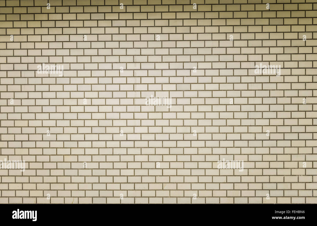 Cream Block wall pattern Stock Photo - Alamy