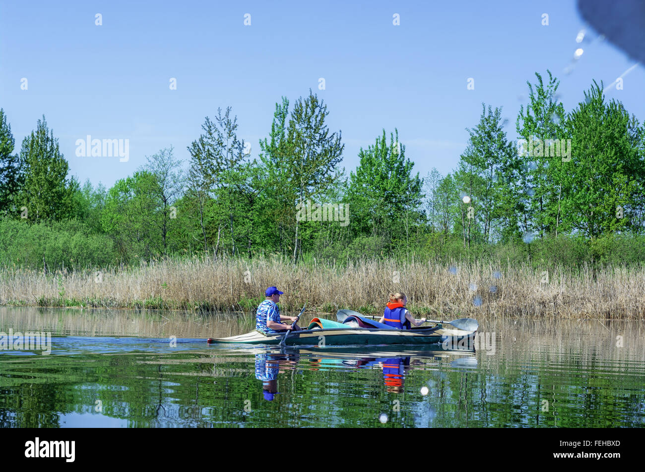 Spring river travel of school students group on canoes - may 2011 Stock ...