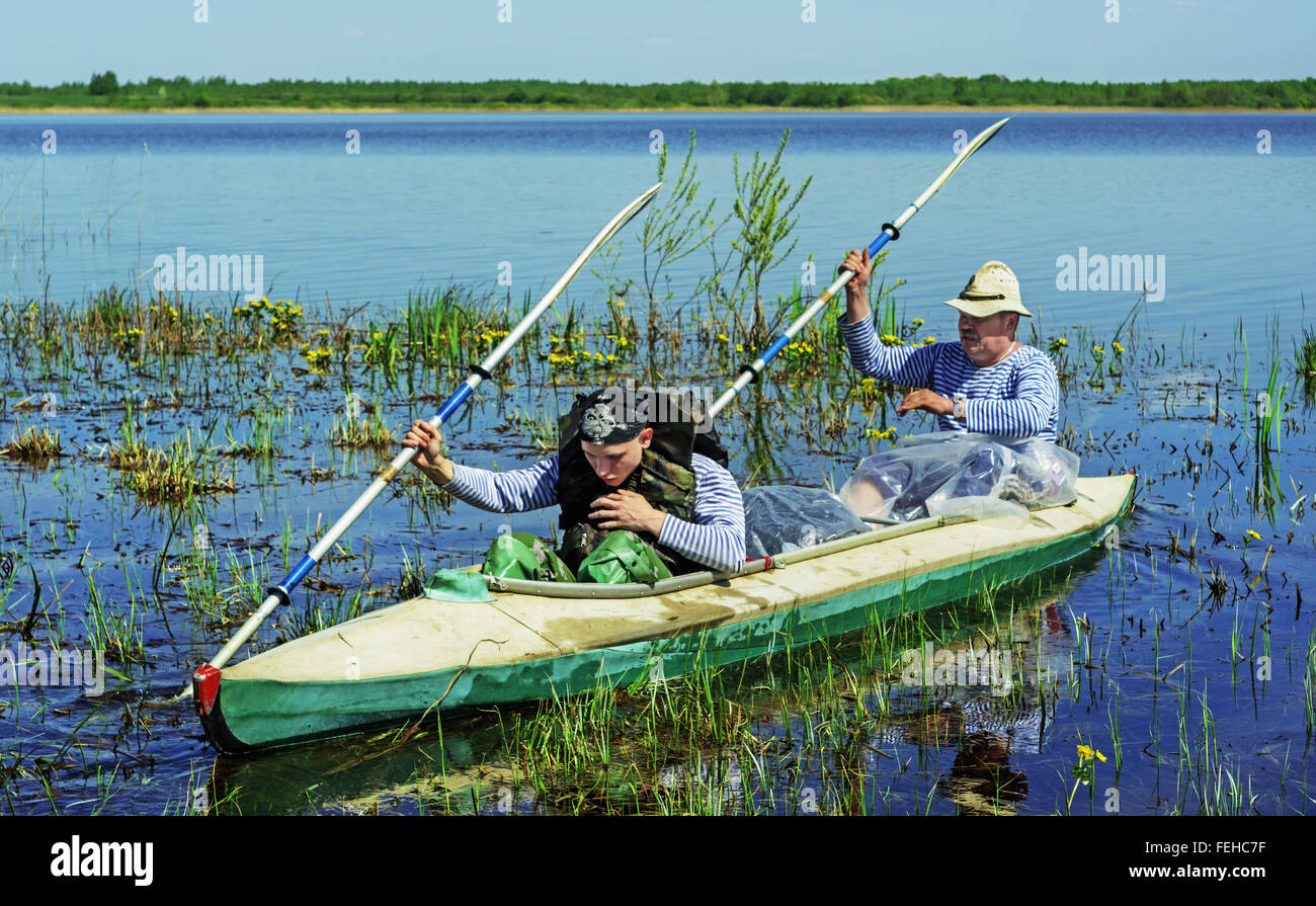 Spring river travel of school students group on canoes - may 2011 Stock ...