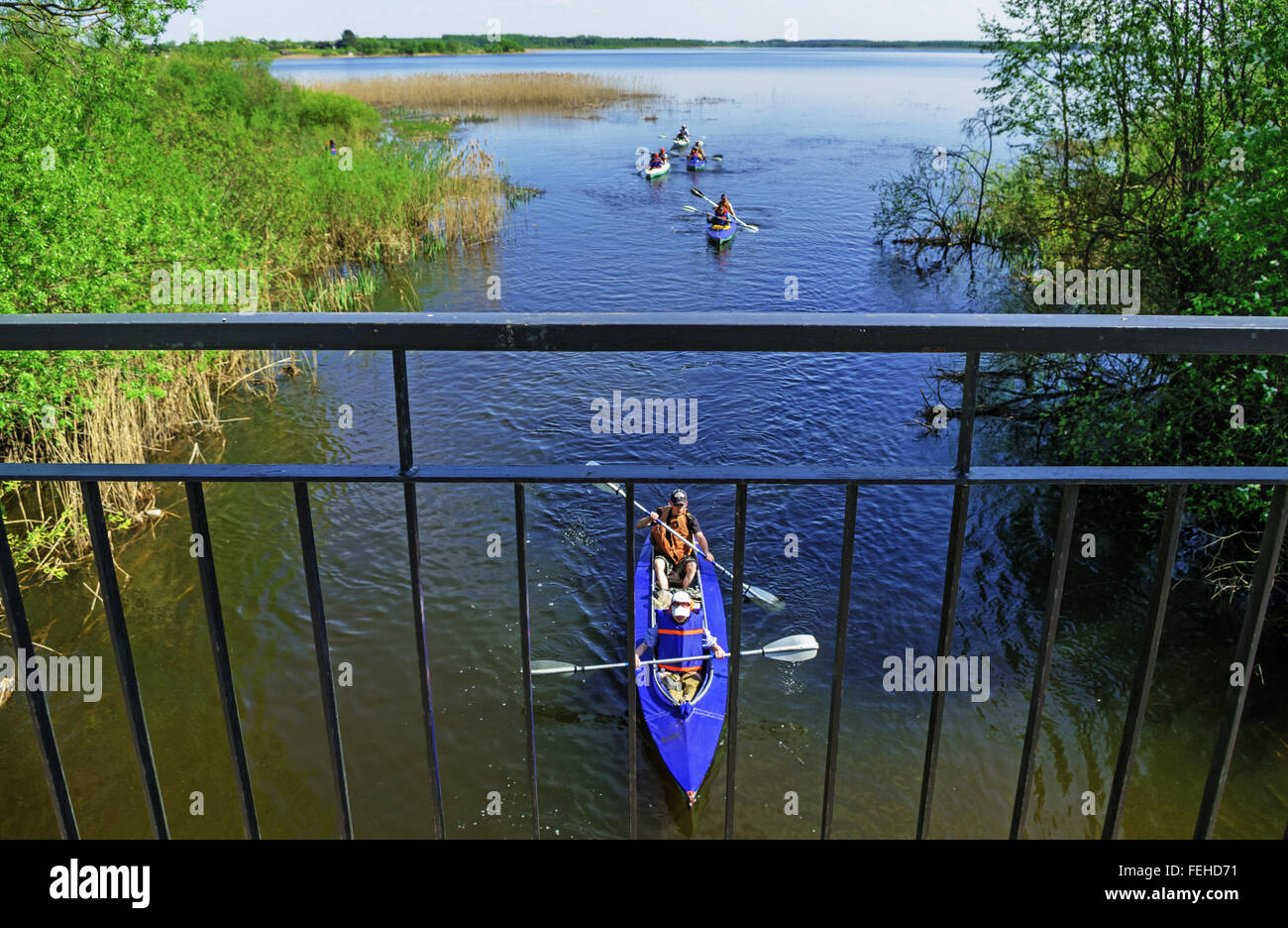Spring river travel of school students group on canoes - may 2011 Stock ...