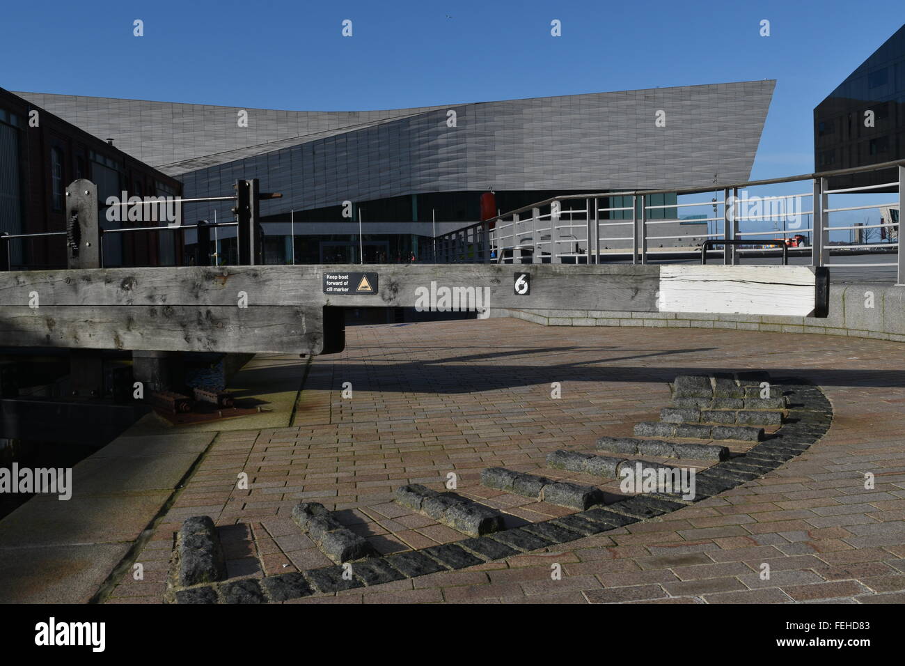Lock gate, Liverpool Waterfront, with the Museum of Liverpool in the ...