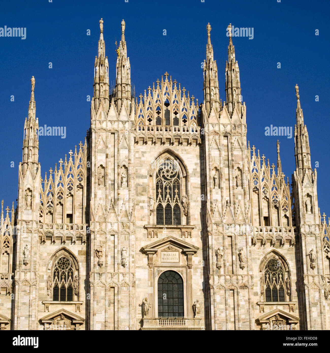 The Gothic facade of Milan Cathedral Stock Photo - Alamy