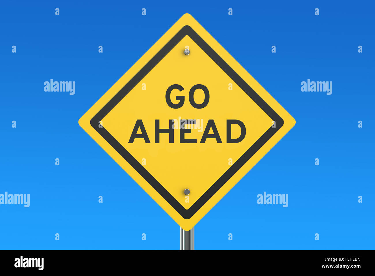 go ahead road sign isolated on blue sky Stock Photo - Alamy