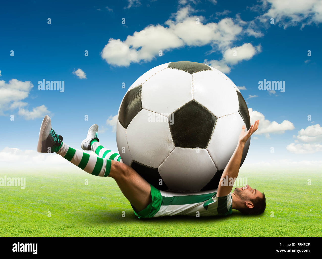 Football-player with a ball Stock Photo - Alamy
