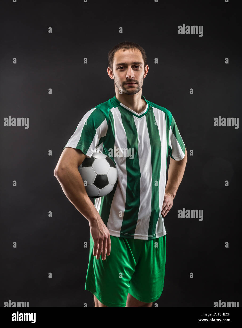 Football-player with a ball Stock Photo - Alamy