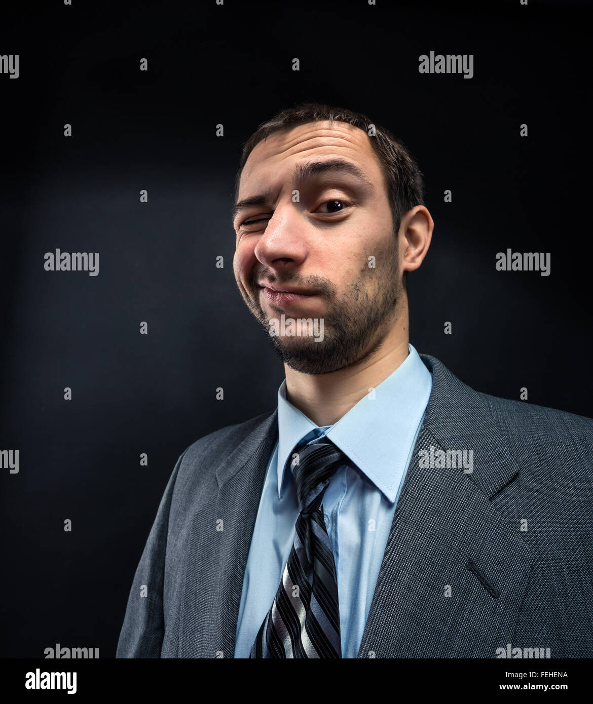 Winking businessman hi-res stock photography and images - Alamy