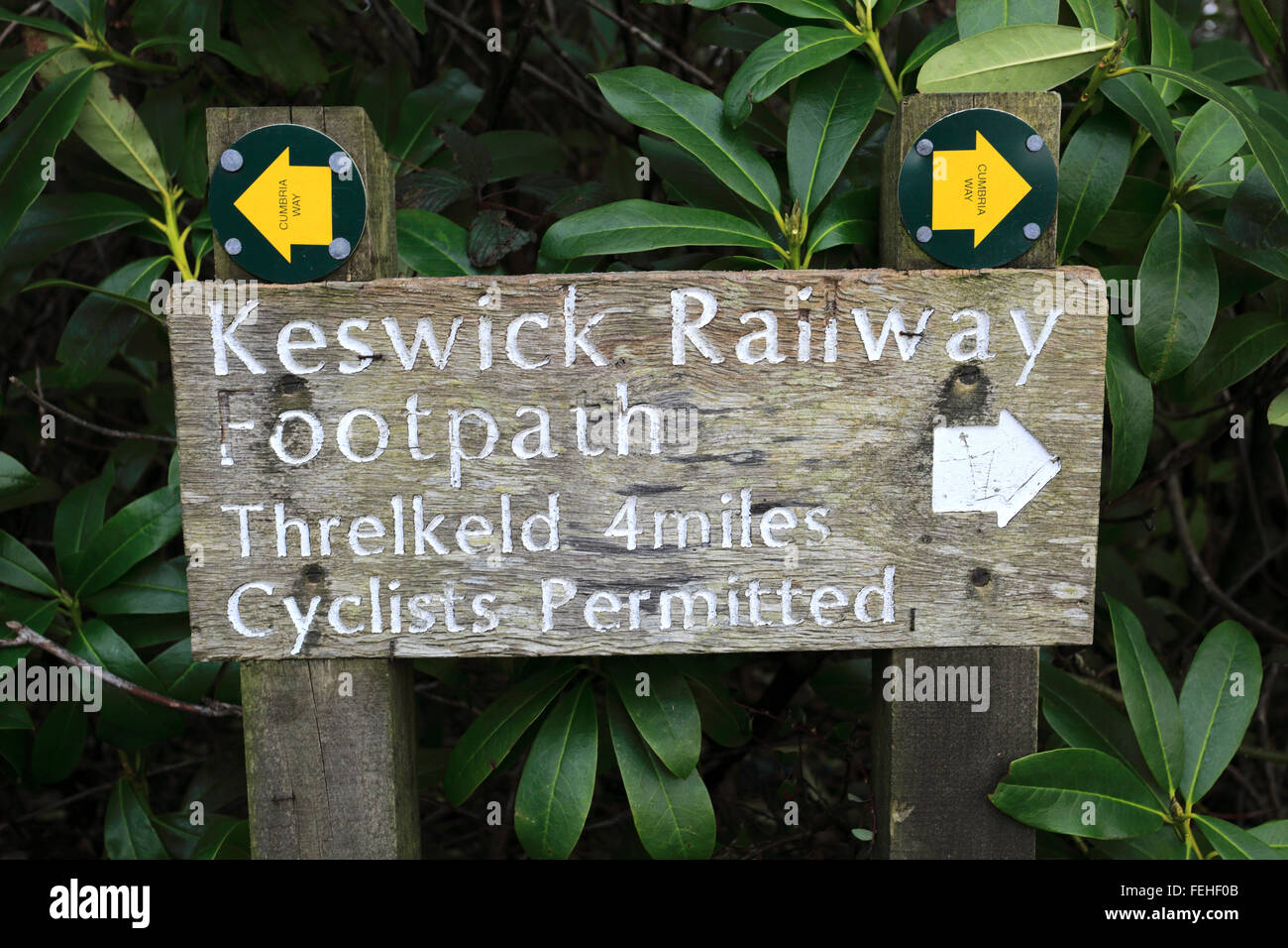 Wooden footpath sign, Keswick town, Lake District National Park ...