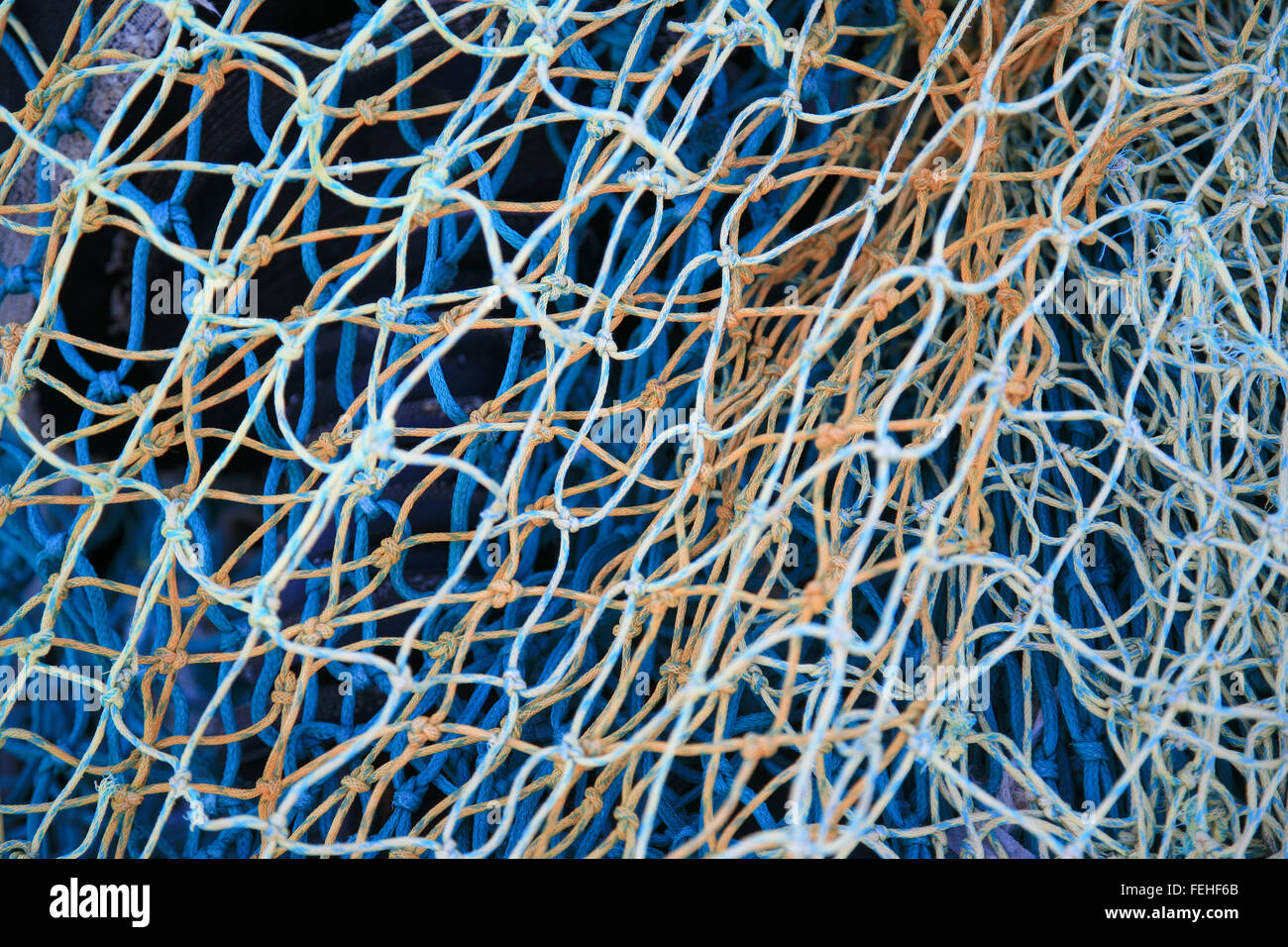 Commercial fishing net abstract background Stock Photo - Alamy