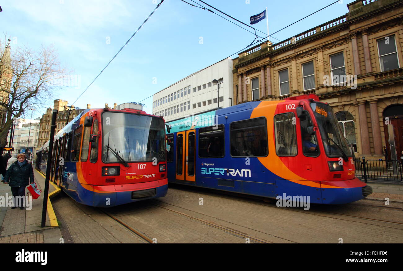 Supertrams pause at the Cathedral tram stop in Sheffield city centre ...