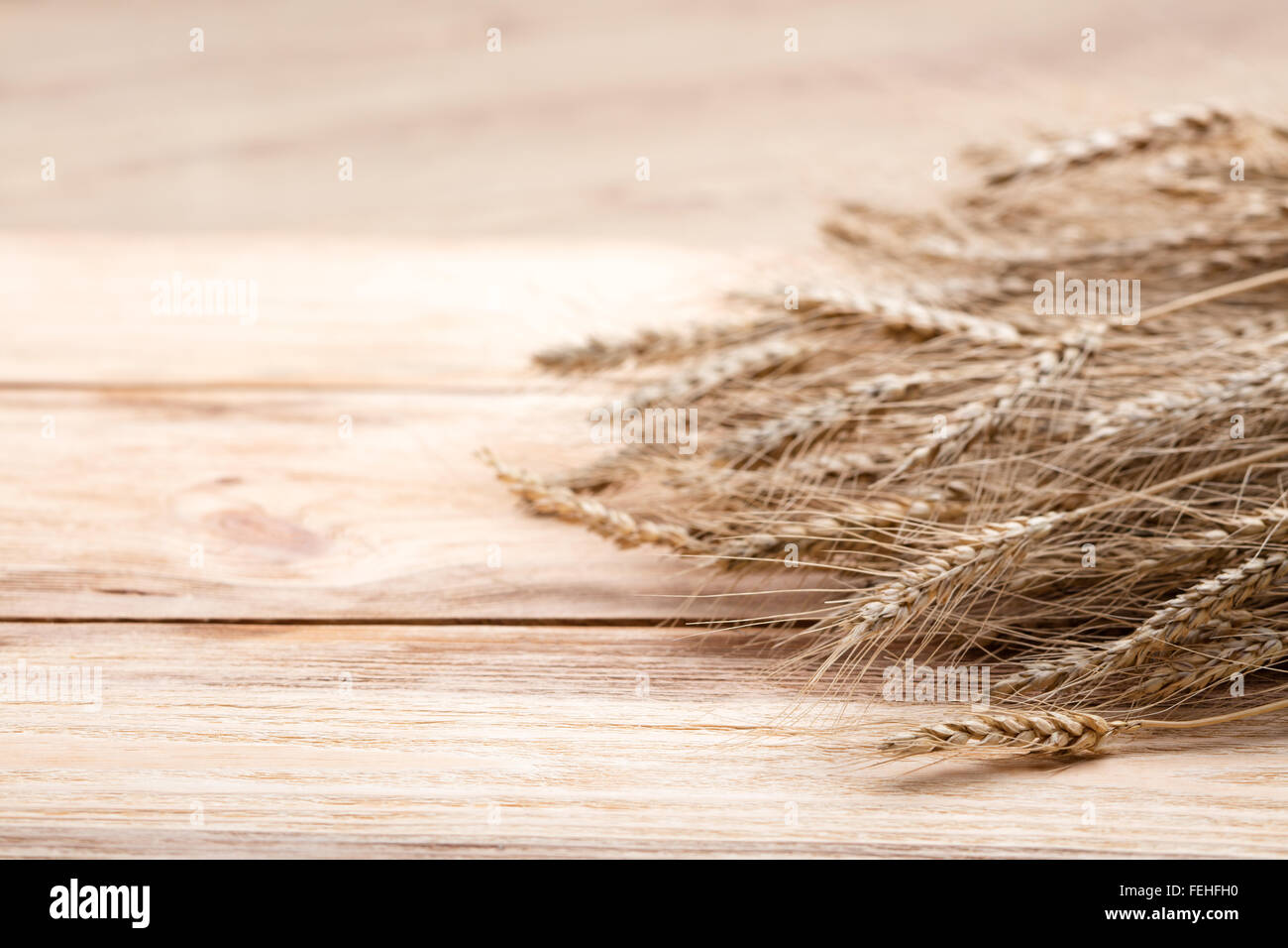 wheat on wood Stock Photo - Alamy