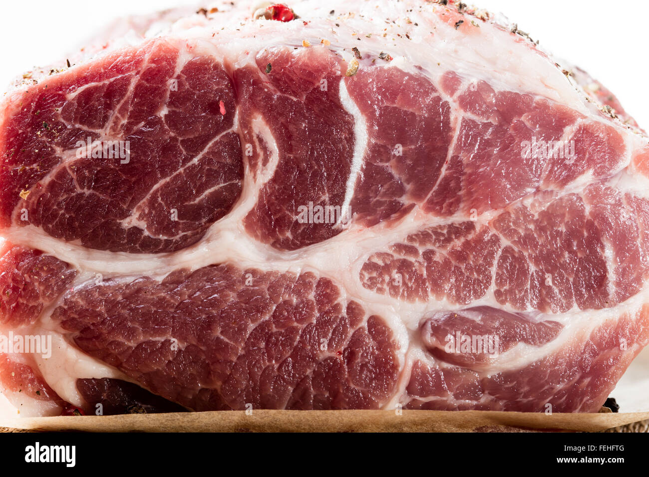 Close up photo of raw meat. Pork neck with herbs Stock Photo - Alamy