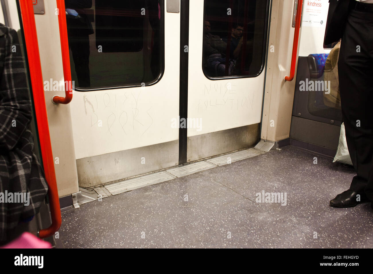 Interior of London Underground Central Line carriage, with 'Noisy Doors ...