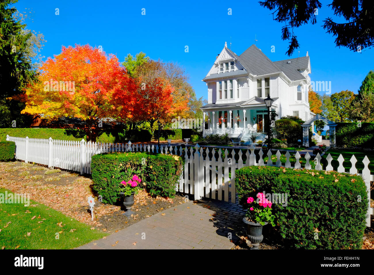Victorian home in autumn setting Stock Photo - Alamy