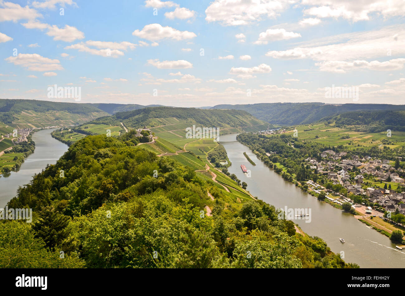 View to river Moselle and Marienburg Castle near village Puenderich ...