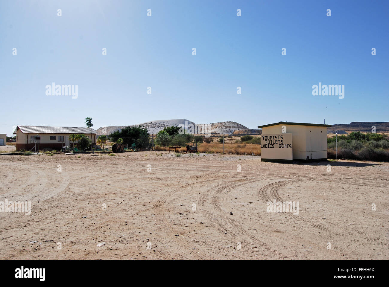 At a gravel road through a remote village near Outjo in Namibia, Africa ...