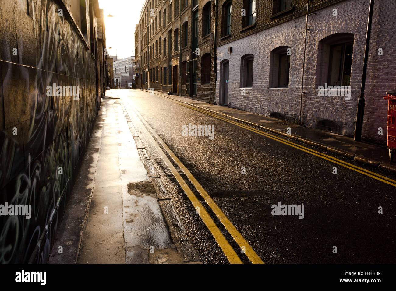 Glow of sunset on street in Shoreditch, East London Stock Photo - Alamy