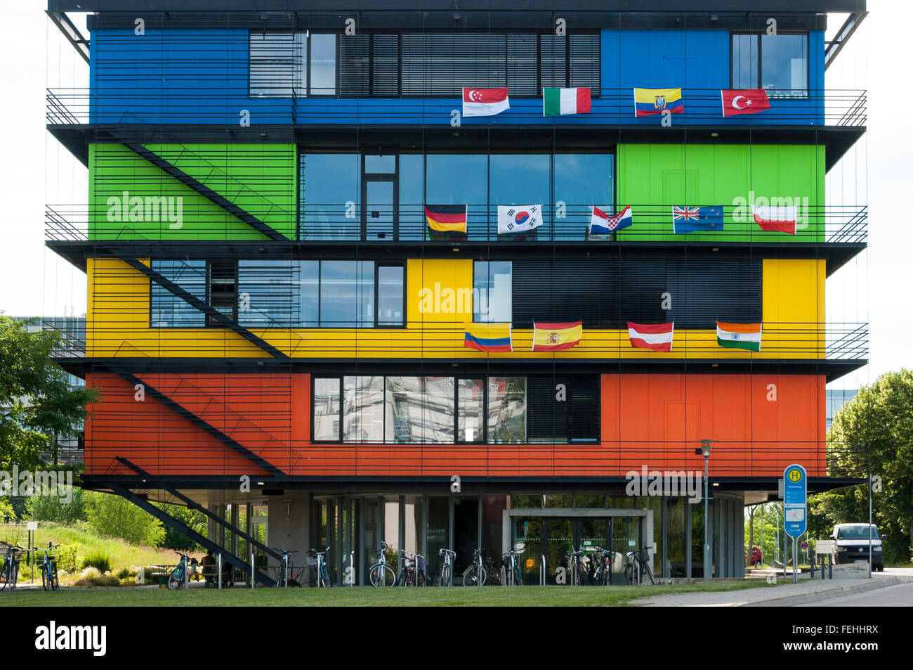 Colourful University building with several flags in Göttingen Germany ...