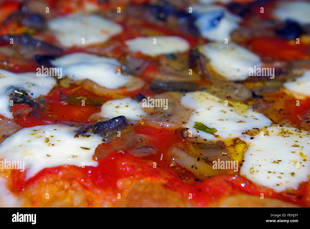Rustic mozzarella cheese tomato pizza hi-res stock photography and ...