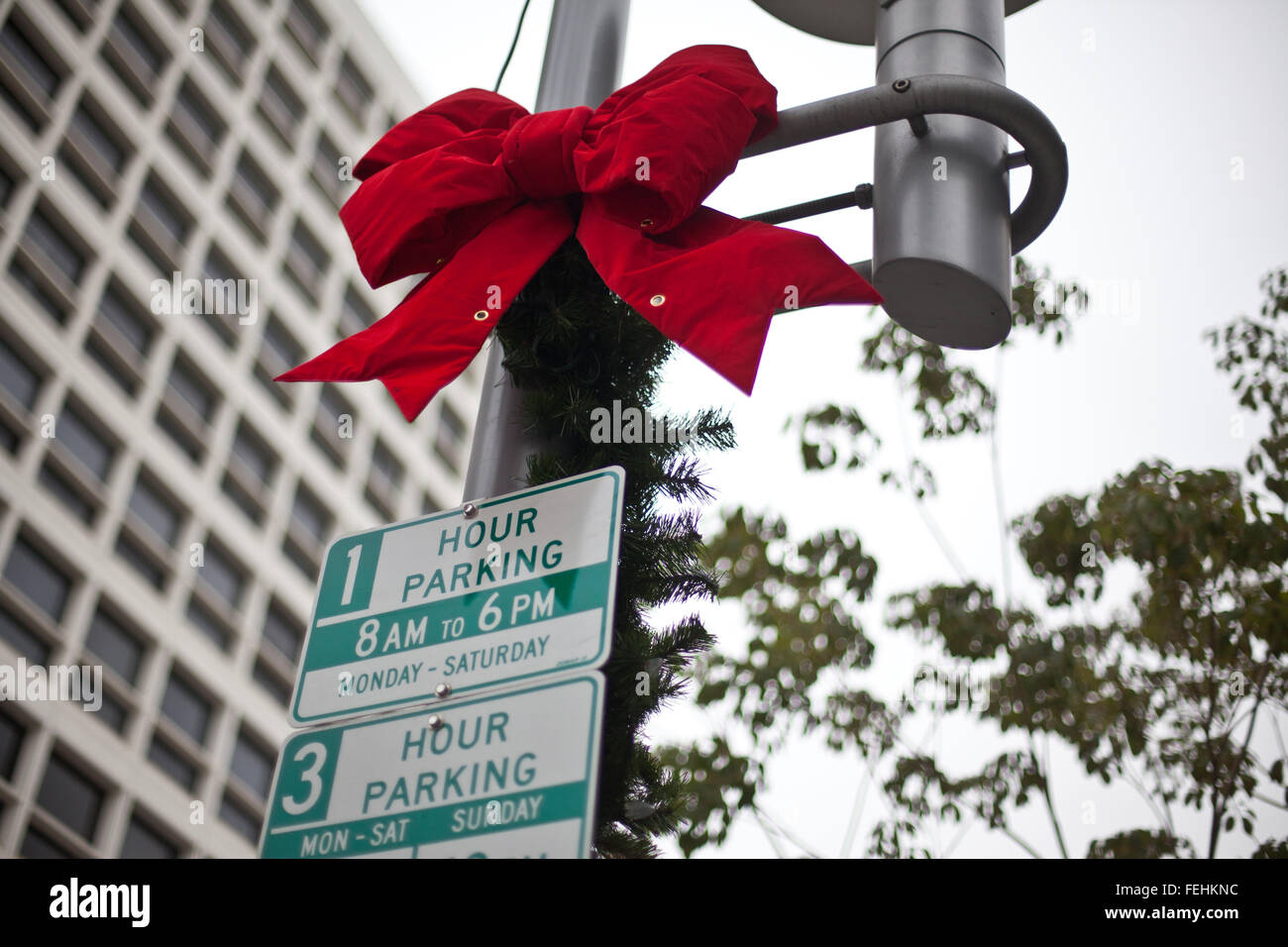 Red bow holiday decoration on lamp post in Beverly Hills, Los Angeles ...