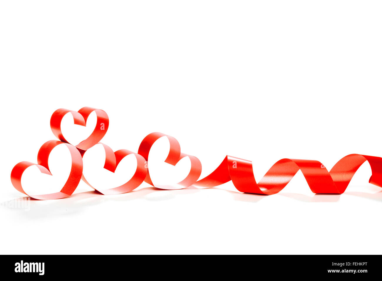 Ribbons shaped as hearts on white Stock Photo - Alamy