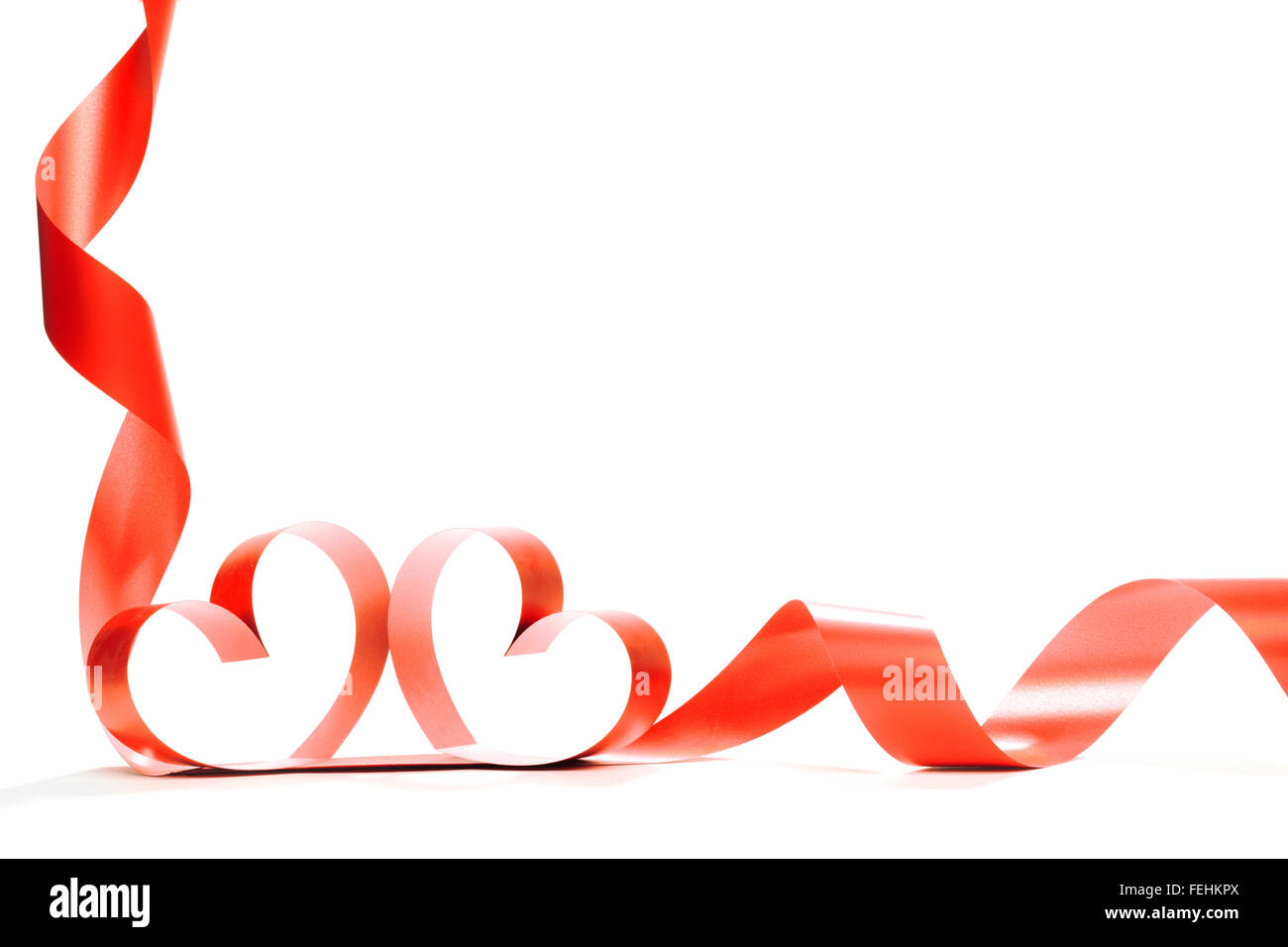 Ribbons shaped as hearts on white Stock Photo - Alamy