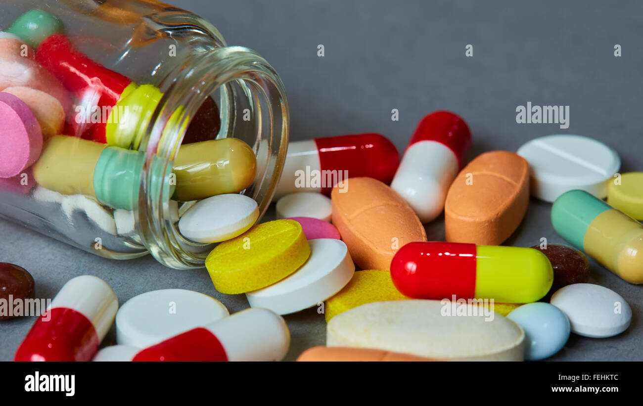Close up of many colorful pills Stock Photo - Alamy