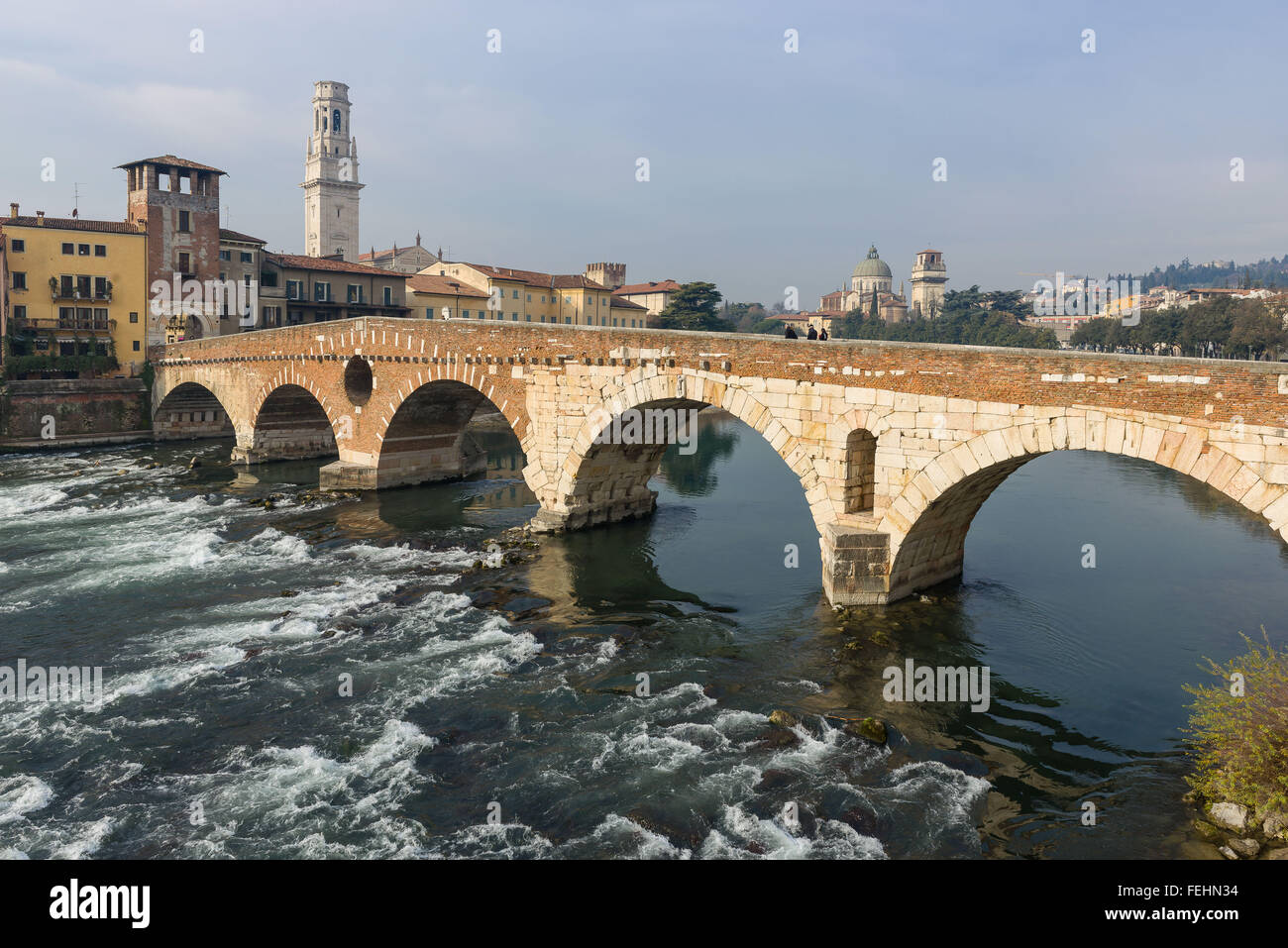 Ponte Pietra on river Adige, ancient roman bridge in the old town of ...