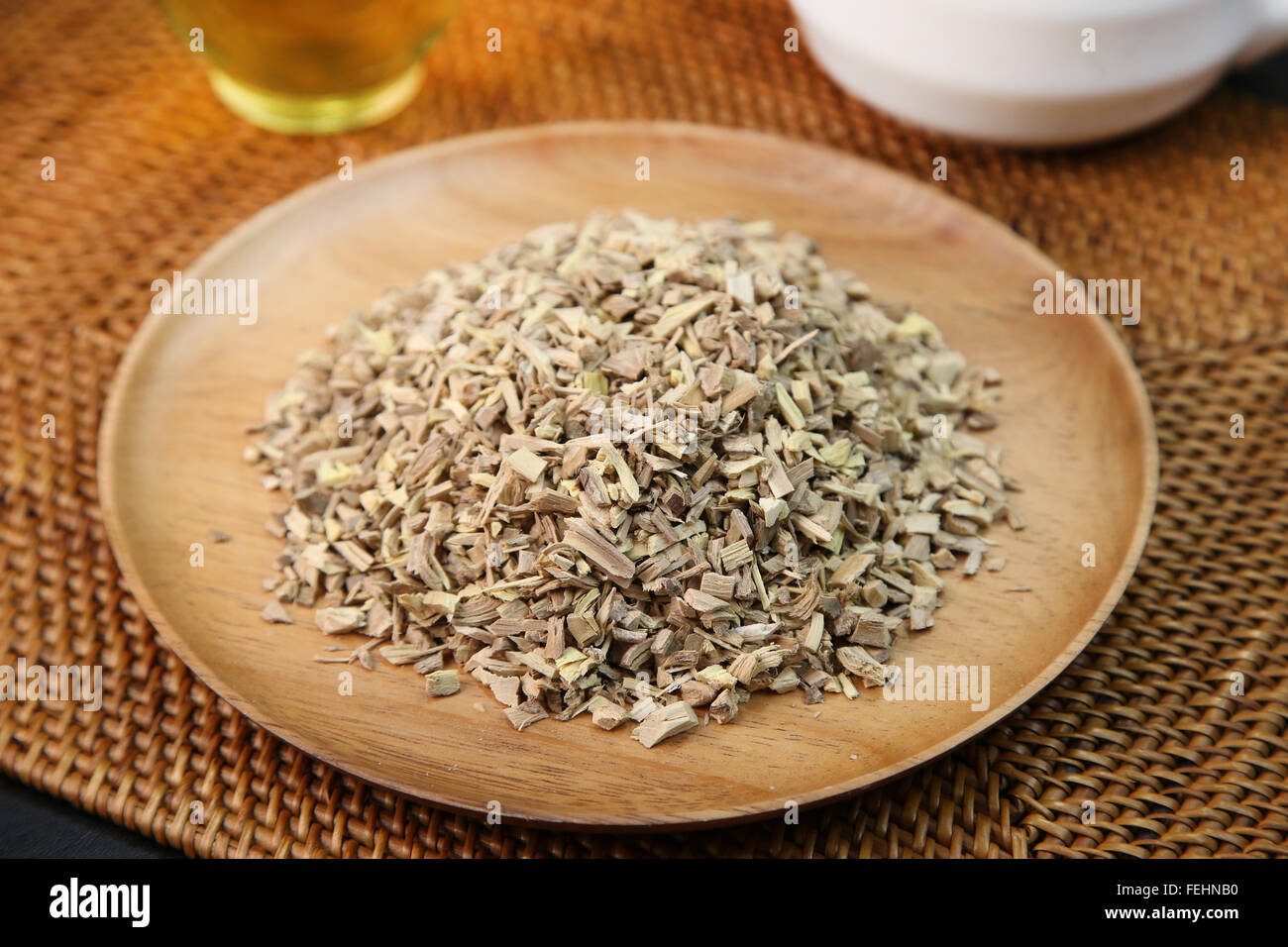 Healthy tea leaves on wooden plate Stock Photo - Alamy