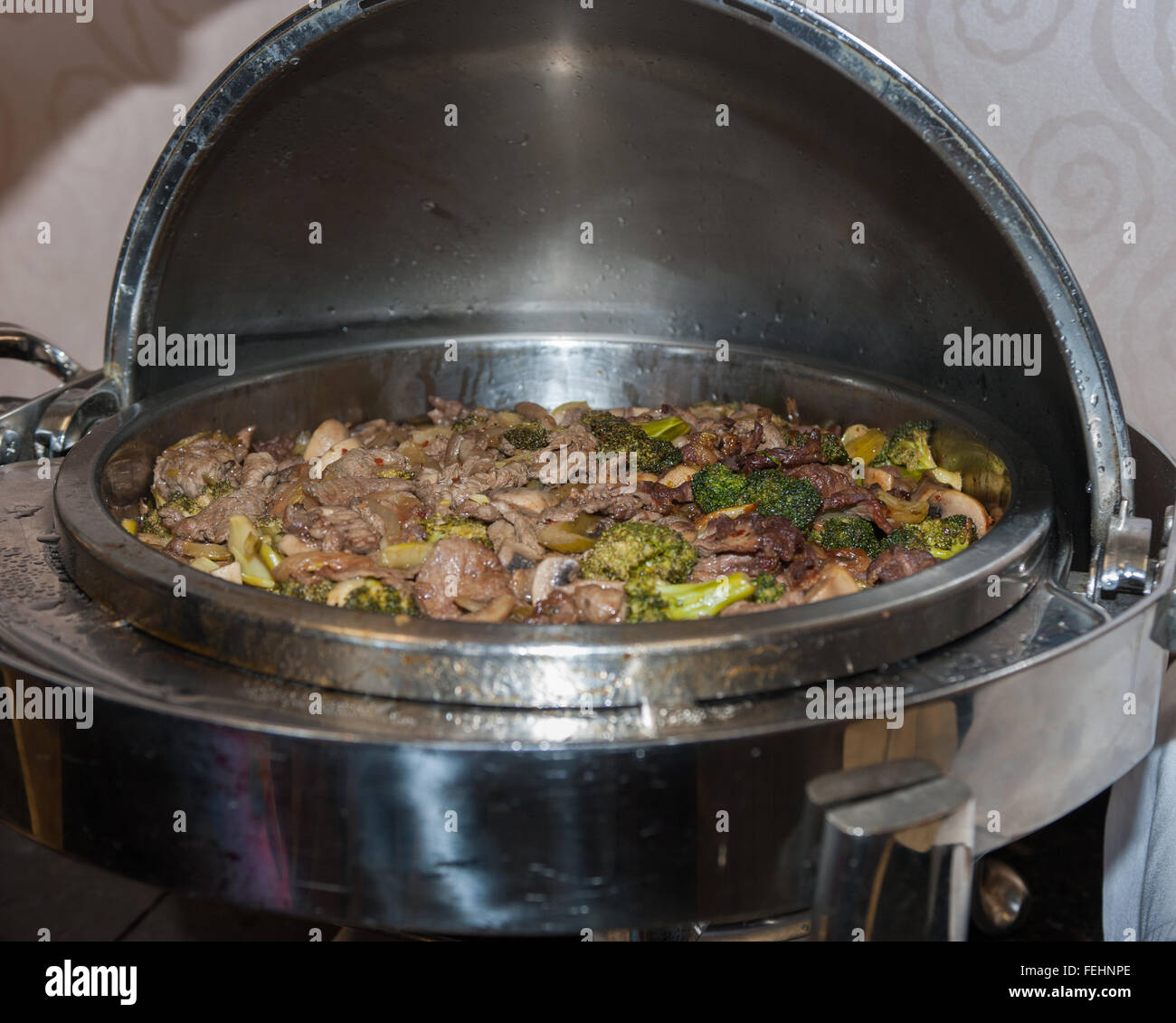 Beef and broccoli on the lunch buffet Stock Photo - Alamy