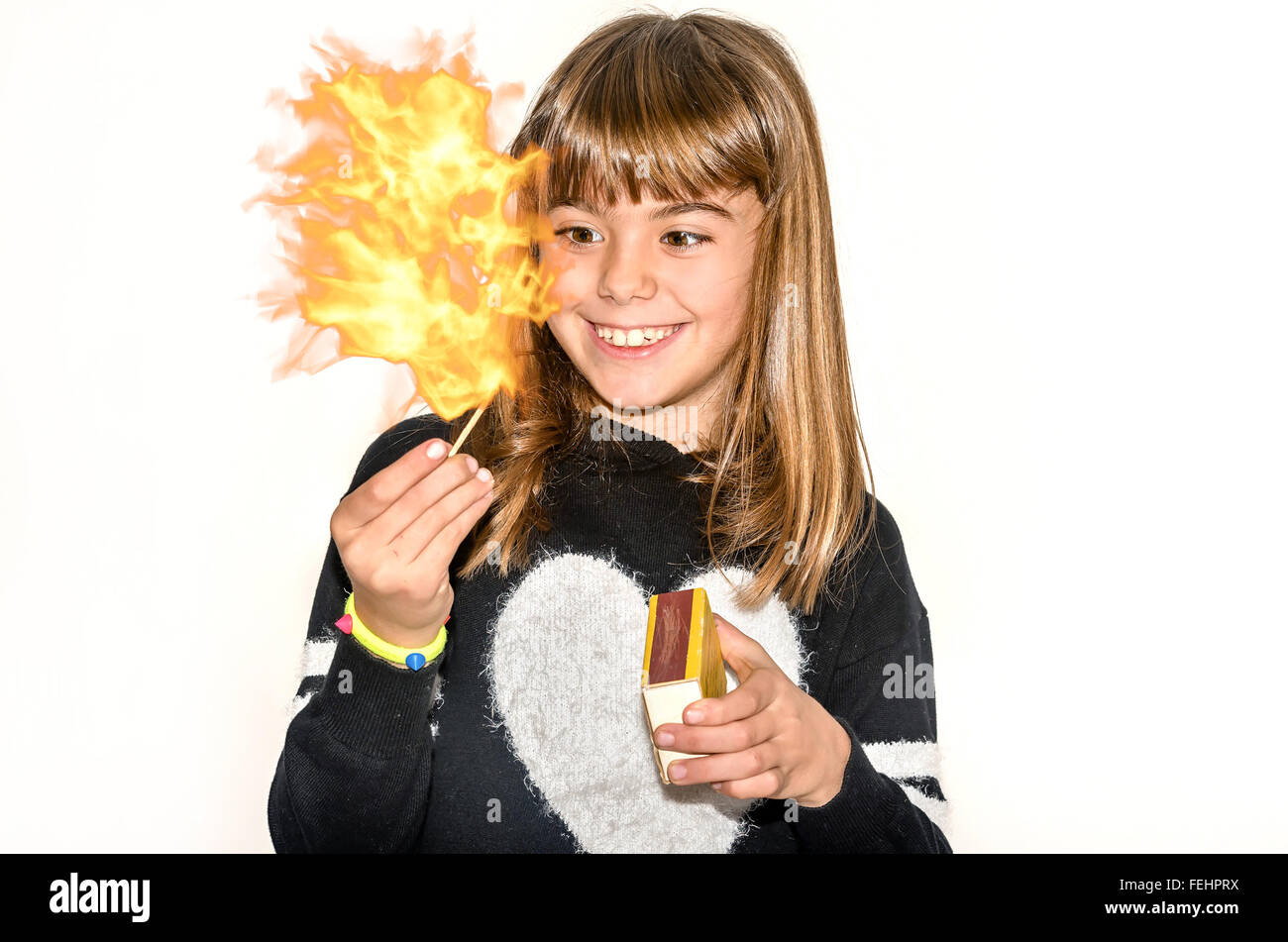 Girl with matches hi-res stock photography and images - Alamy
