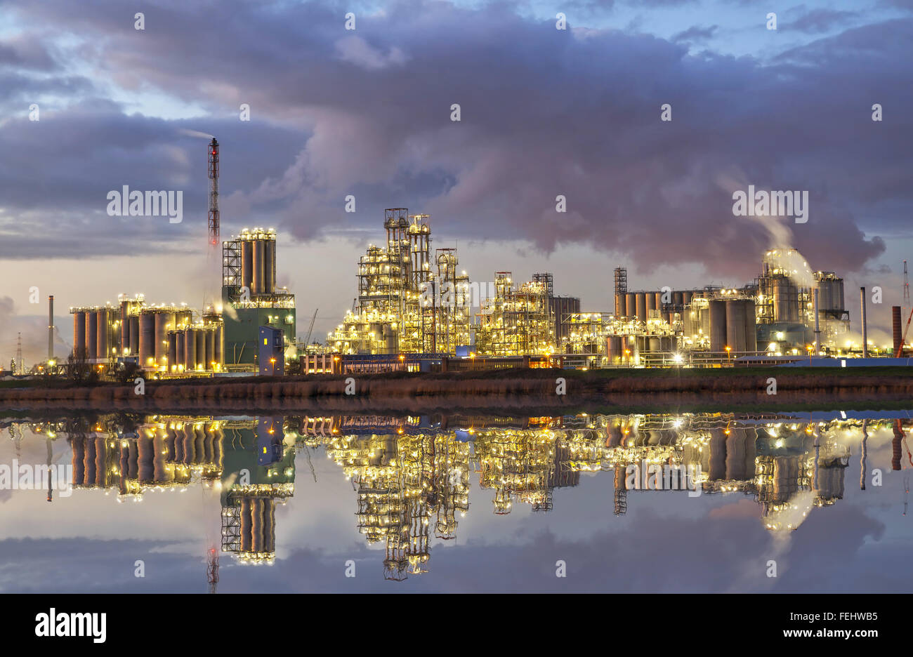 Oil refining factory in the industrial area of Antwerp during dusk ...