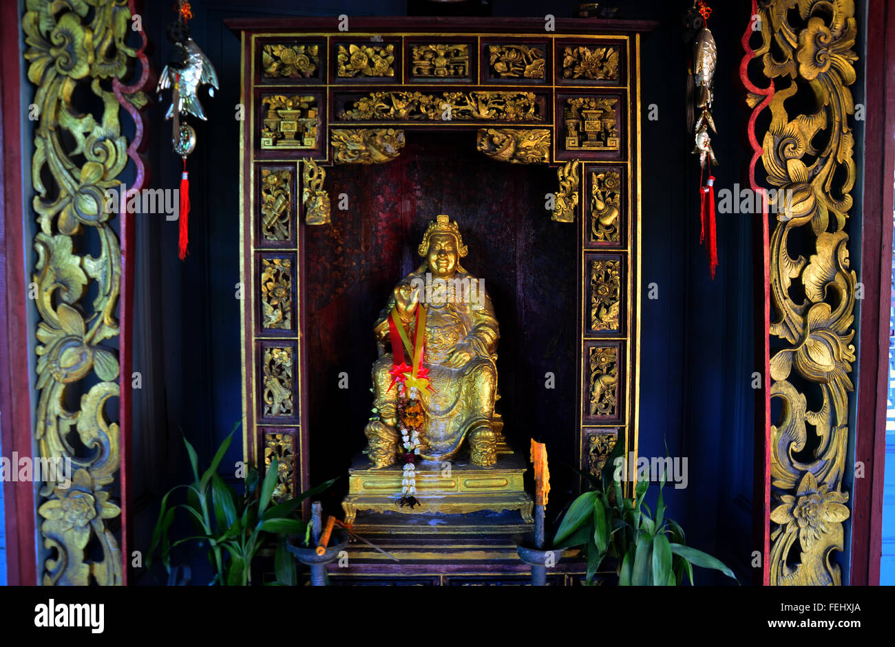 Guan Yu statue in Joss house for people praying Stock Photo - Alamy