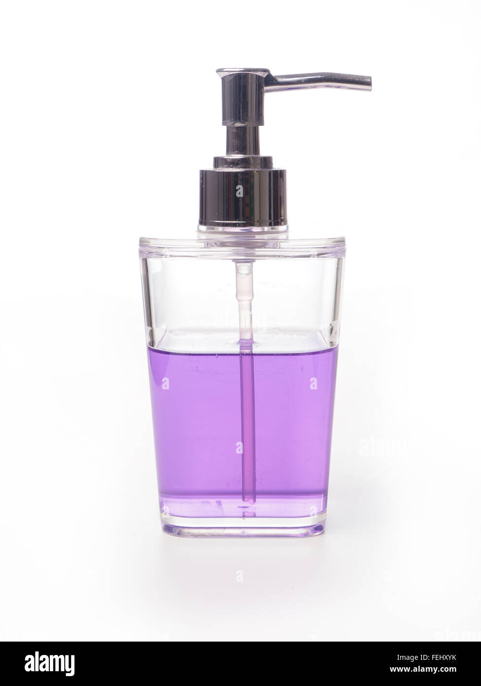 Soap dispenser with purple soap on a white background Stock Photo - Alamy