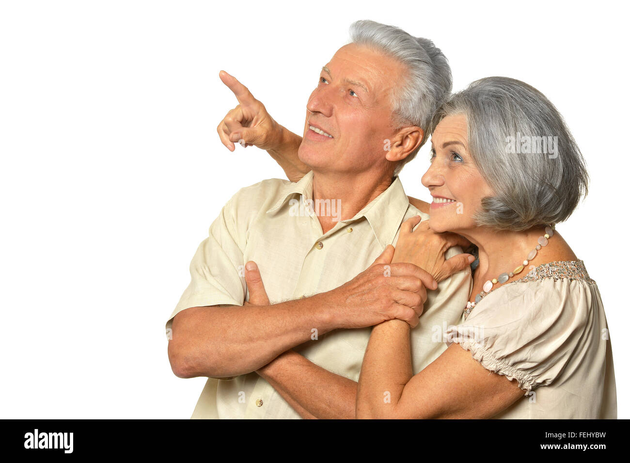 Elderly couple pointing Stock Photo - Alamy