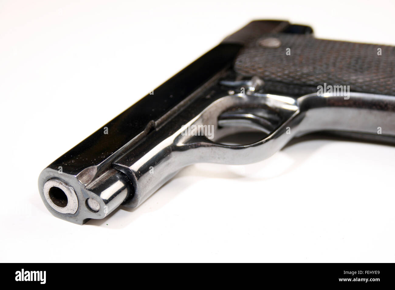 Hand gun at the white background Stock Photo - Alamy