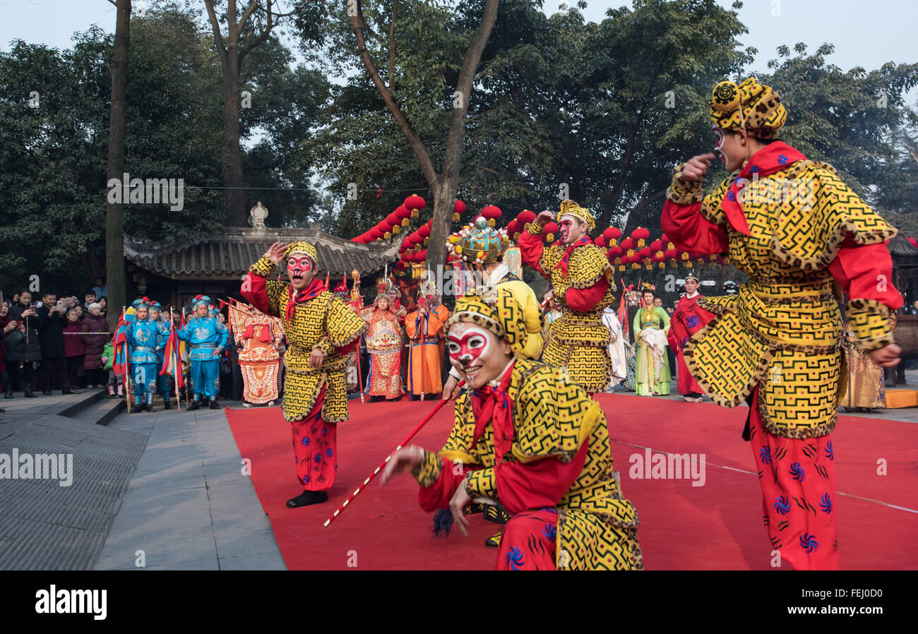 Chengdu. 8th Feb, 2016. Actors stage a performance during a temple fair ...