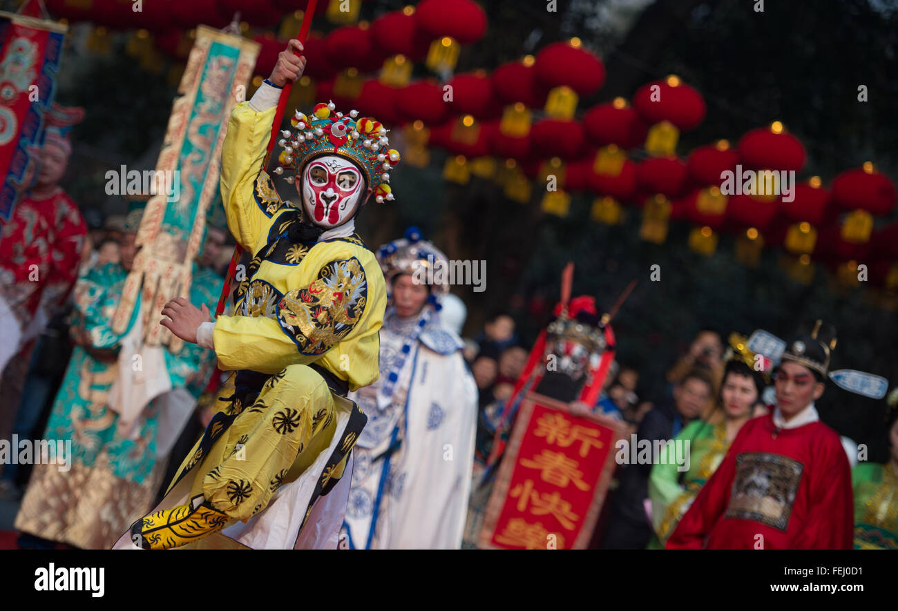 Chengdu. 8th Feb, 2016. Actors stage a performance during a temple fair ...