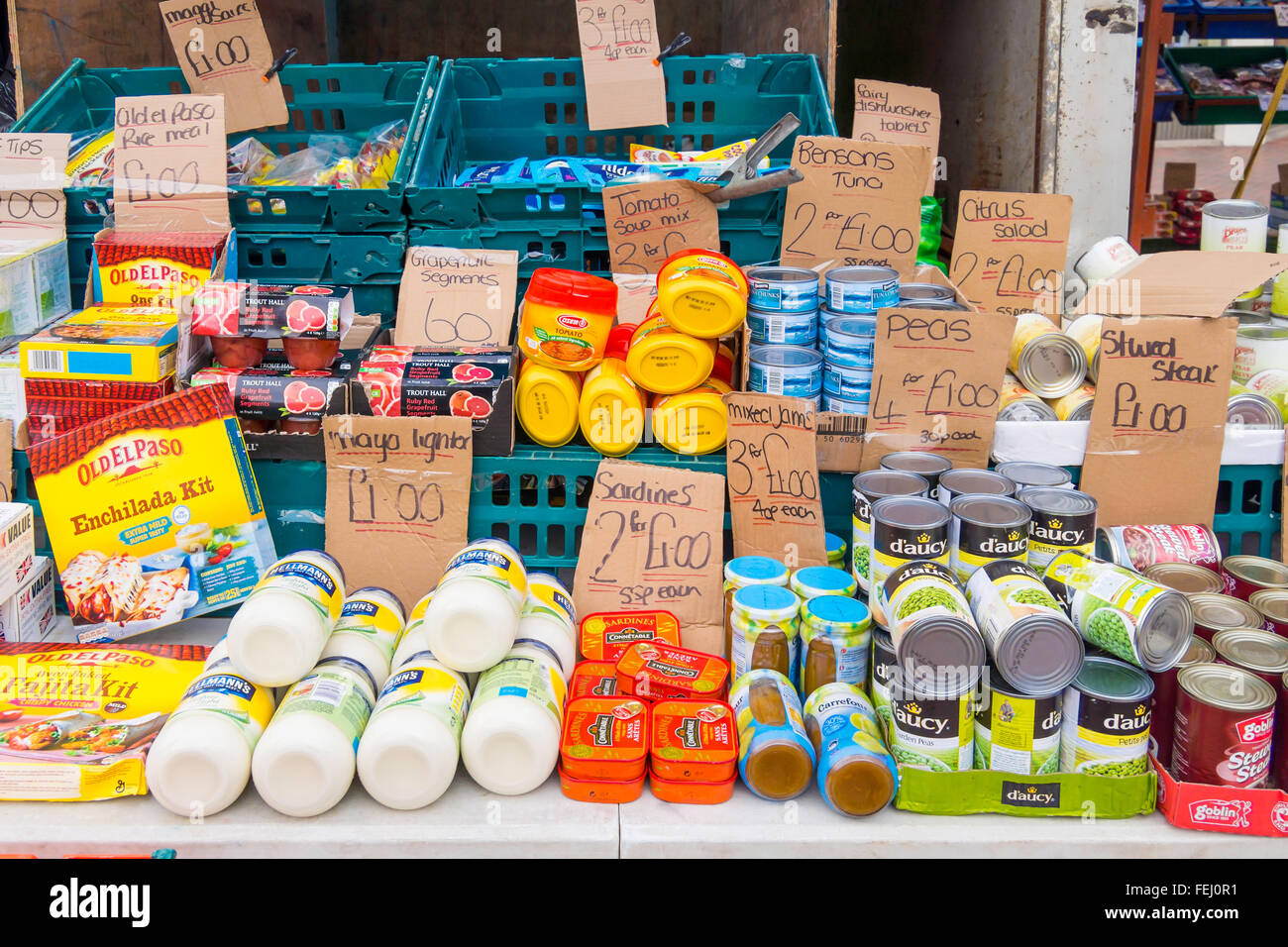 Display of very cheap food and household goods at the Weekly Market in ...