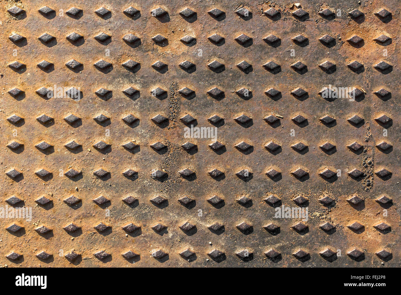 Close-up of manhole cover of steel with rust as background Stock Photo ...